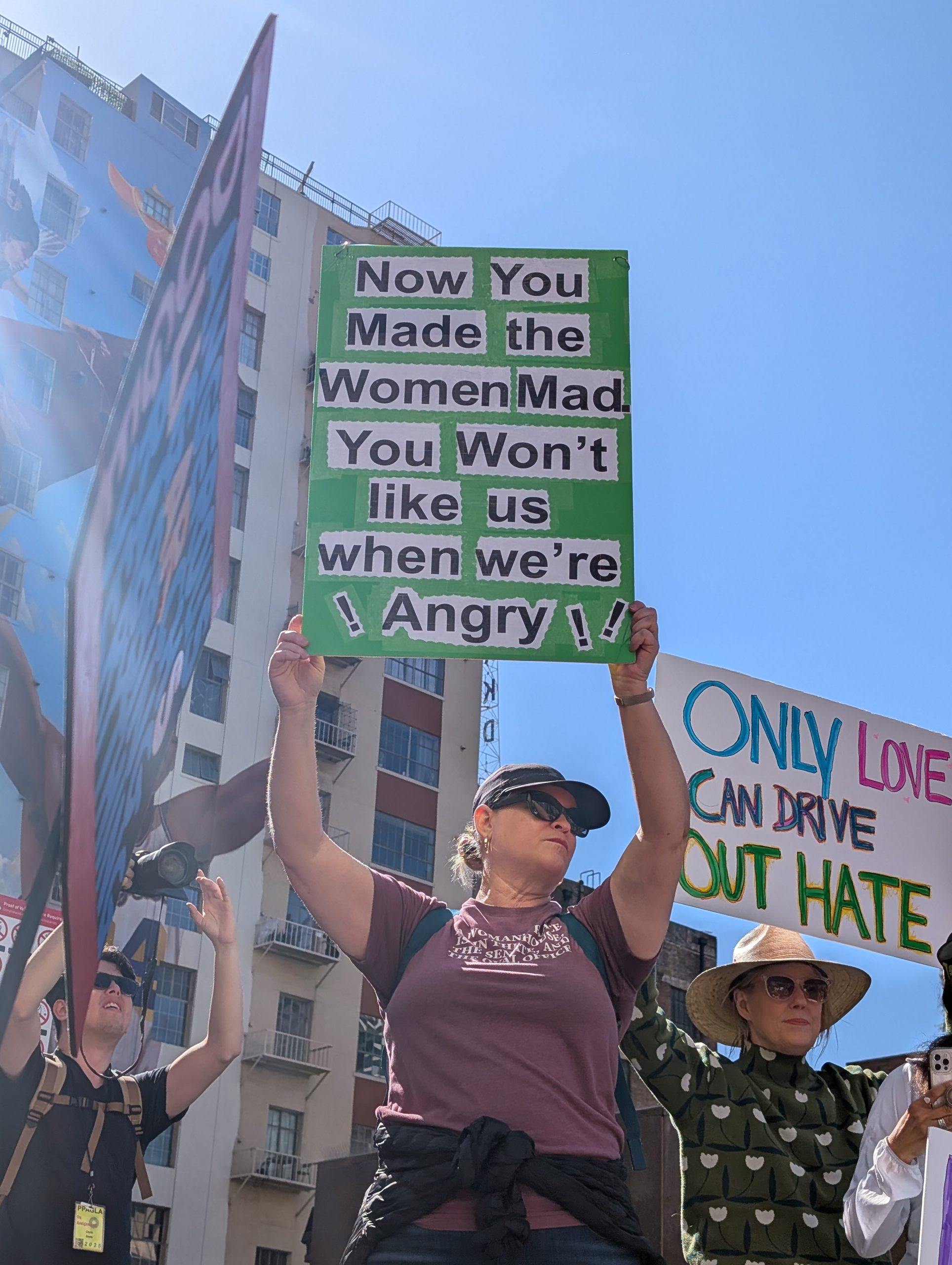 Women in LA Stand up for Democracy Protesting Donald Trump and Elon ...
