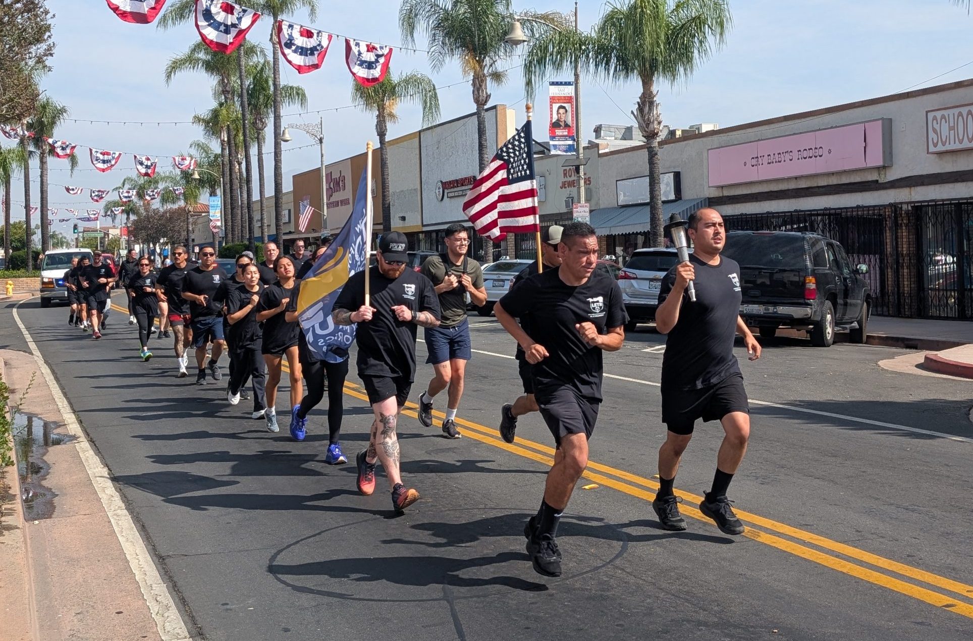 Special Olympics Athlete and SFPD Carry the Torch for the Annual Law ...